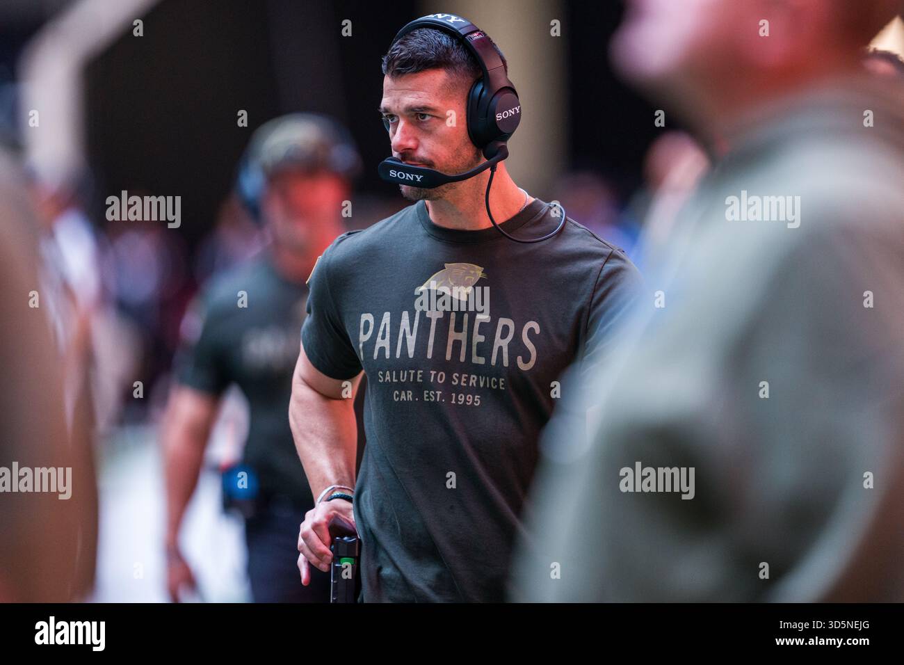 Carolina Panthers head coach Dave Canales works before an NFL football ...
