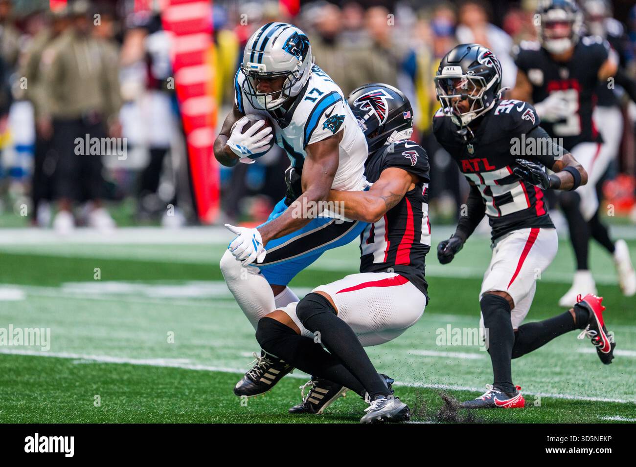 Carolina Panthers wide receiver Xavier Legette (17) is brought down by ...
