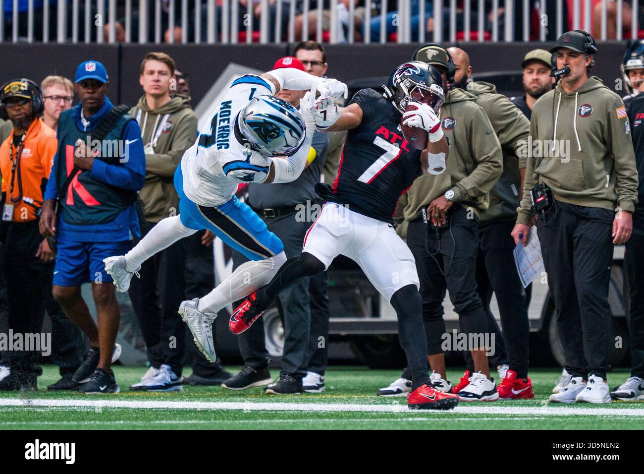 Atlanta Falcons running back Bijan Robinson (7) is pushed out of bounds ...