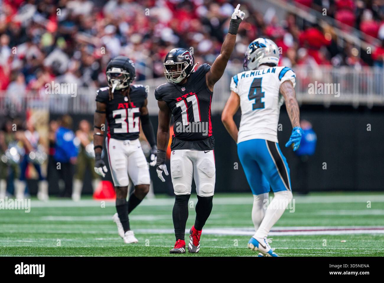 Atlanta Falcons linebacker Jalon Walker (11) signals during the first ...