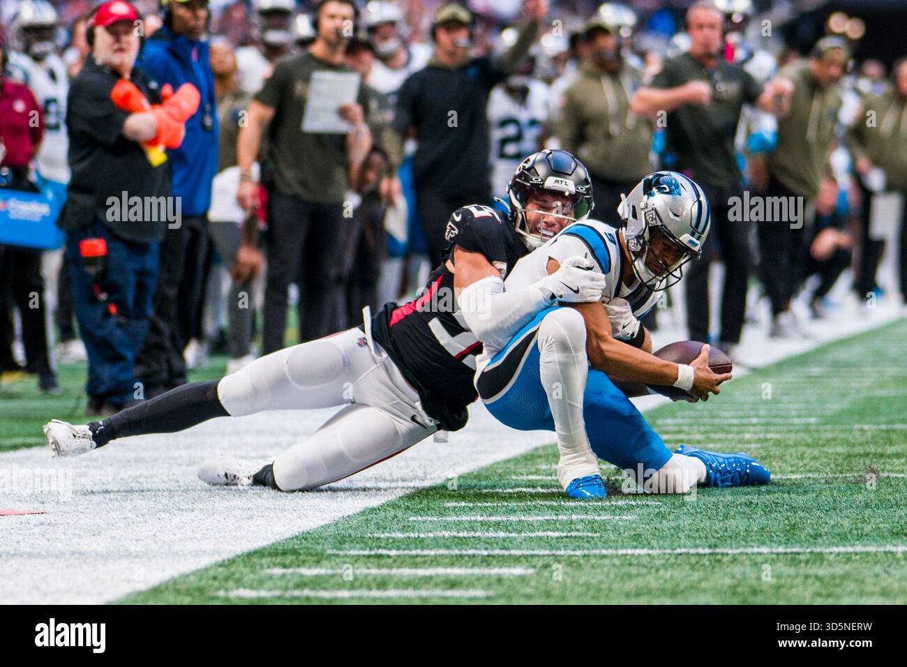 Atlanta Falcons linebacker Kaden Elliss (55) tackles Carolina Panthers ...