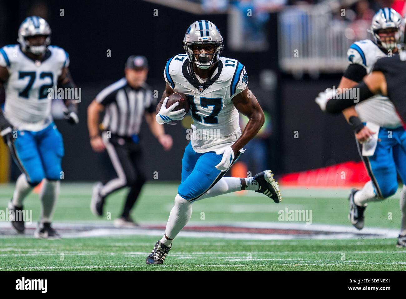 Carolina Panthers wide receiver Xavier Legette (17) runs the ball ...