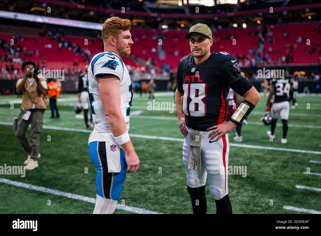 Carolina Panthers quarterback Andy Dalton (14) chats with Atlanta ...