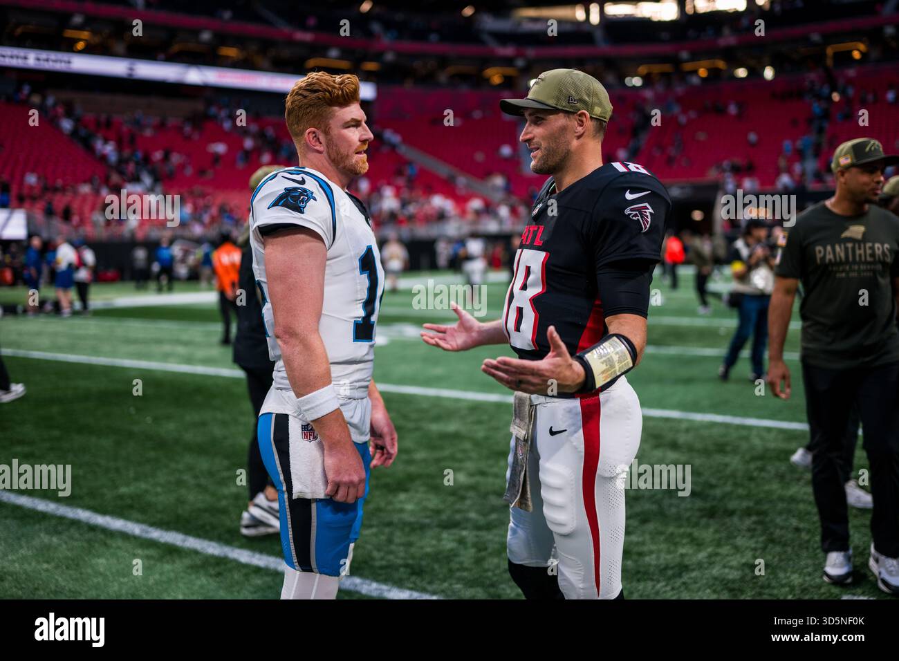 Carolina Panthers quarterback Andy Dalton (14) chats with Atlanta ...