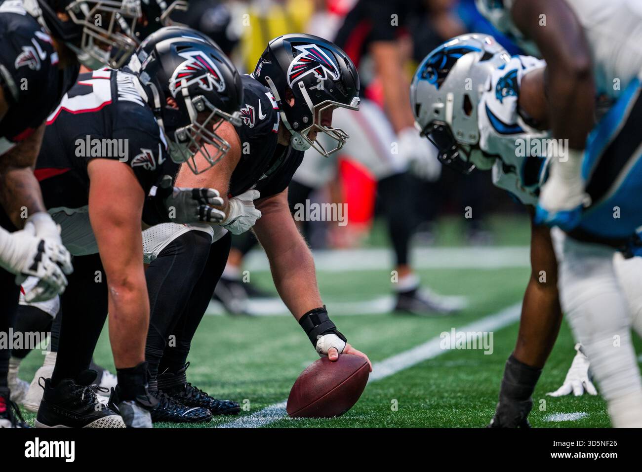 Atlanta Falcons guard Ryan Neuzil (64) lines up during the second half ...