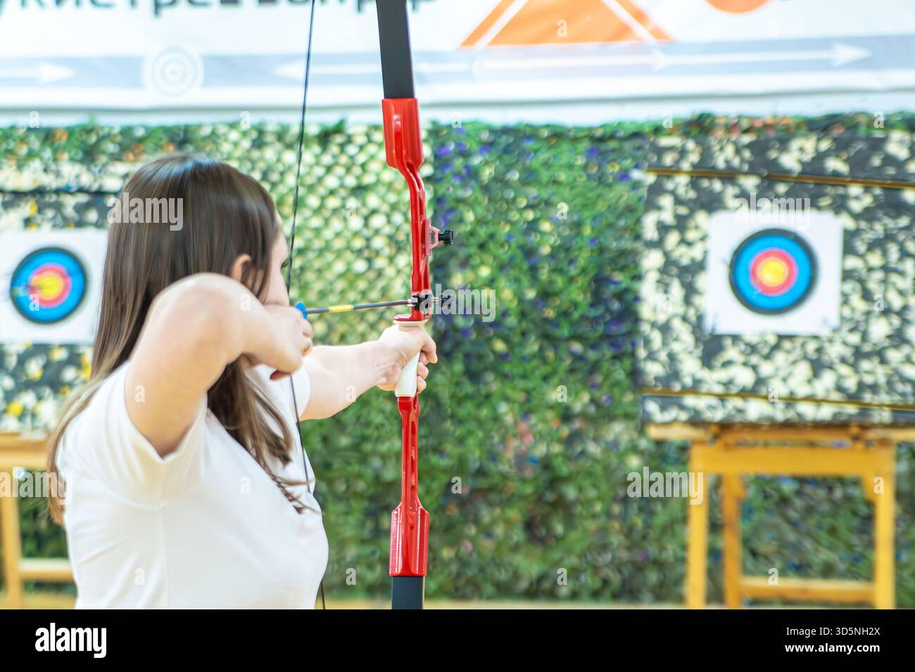 The precise hand position and tension on the bowstring determine the ...