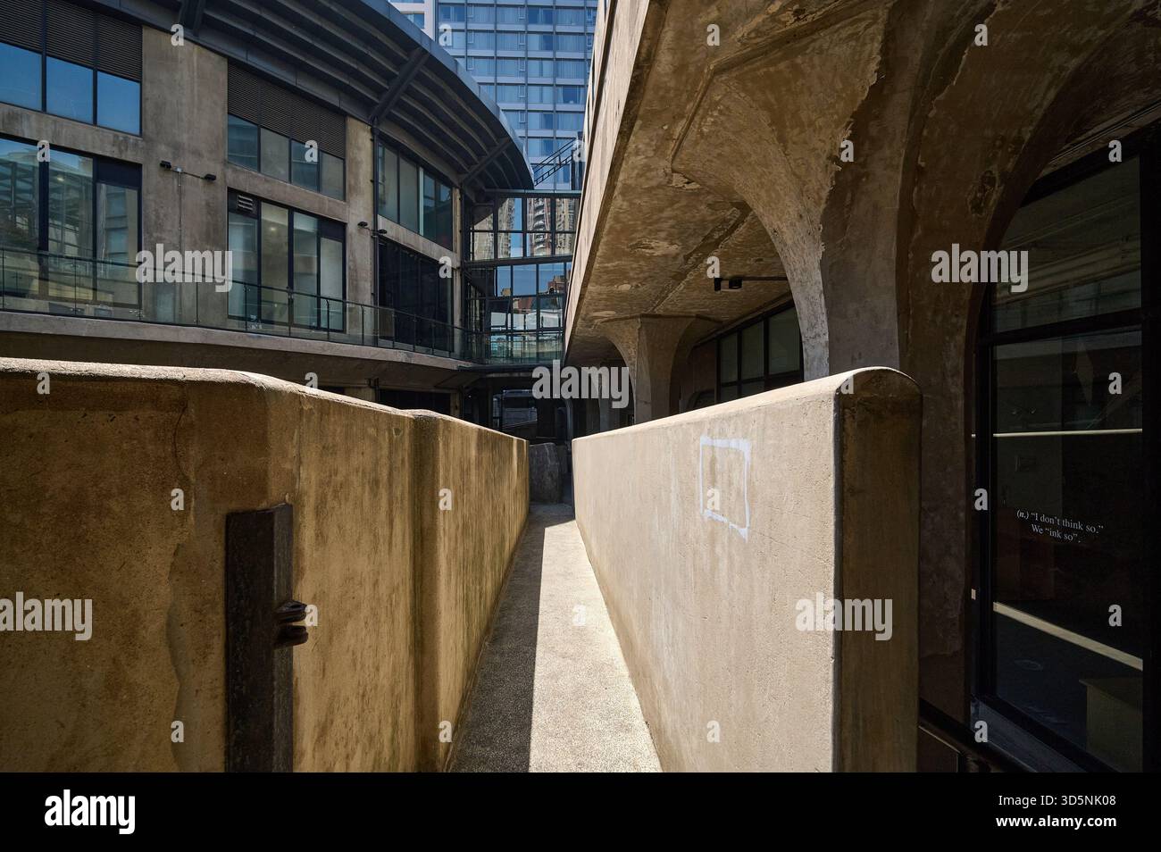 Minimalist brutalist gallery space glass windows arched ceiling ...