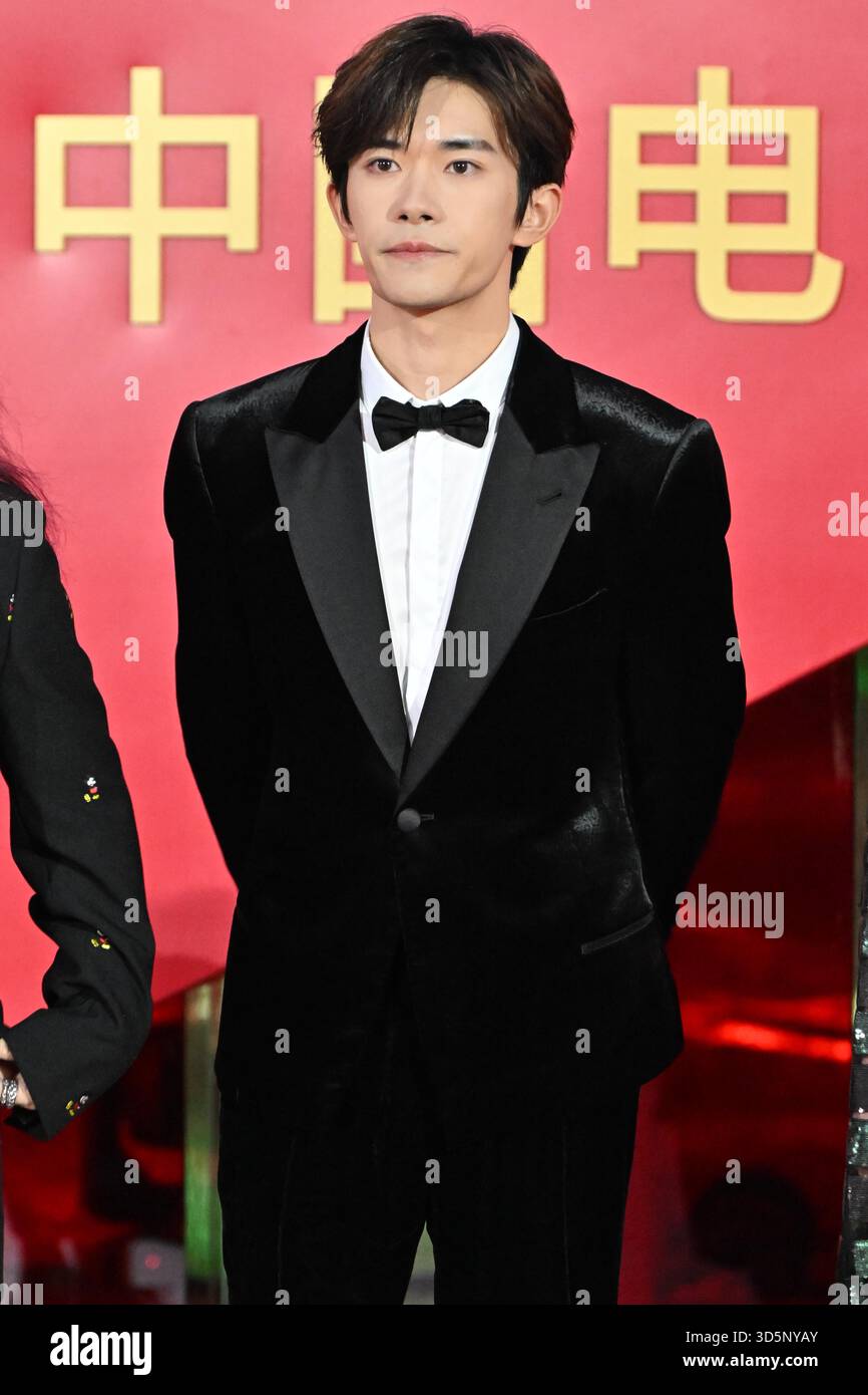Chinese actor, dancer and singer Jackson Yee poses for a photo on the red carpet at the closing ...