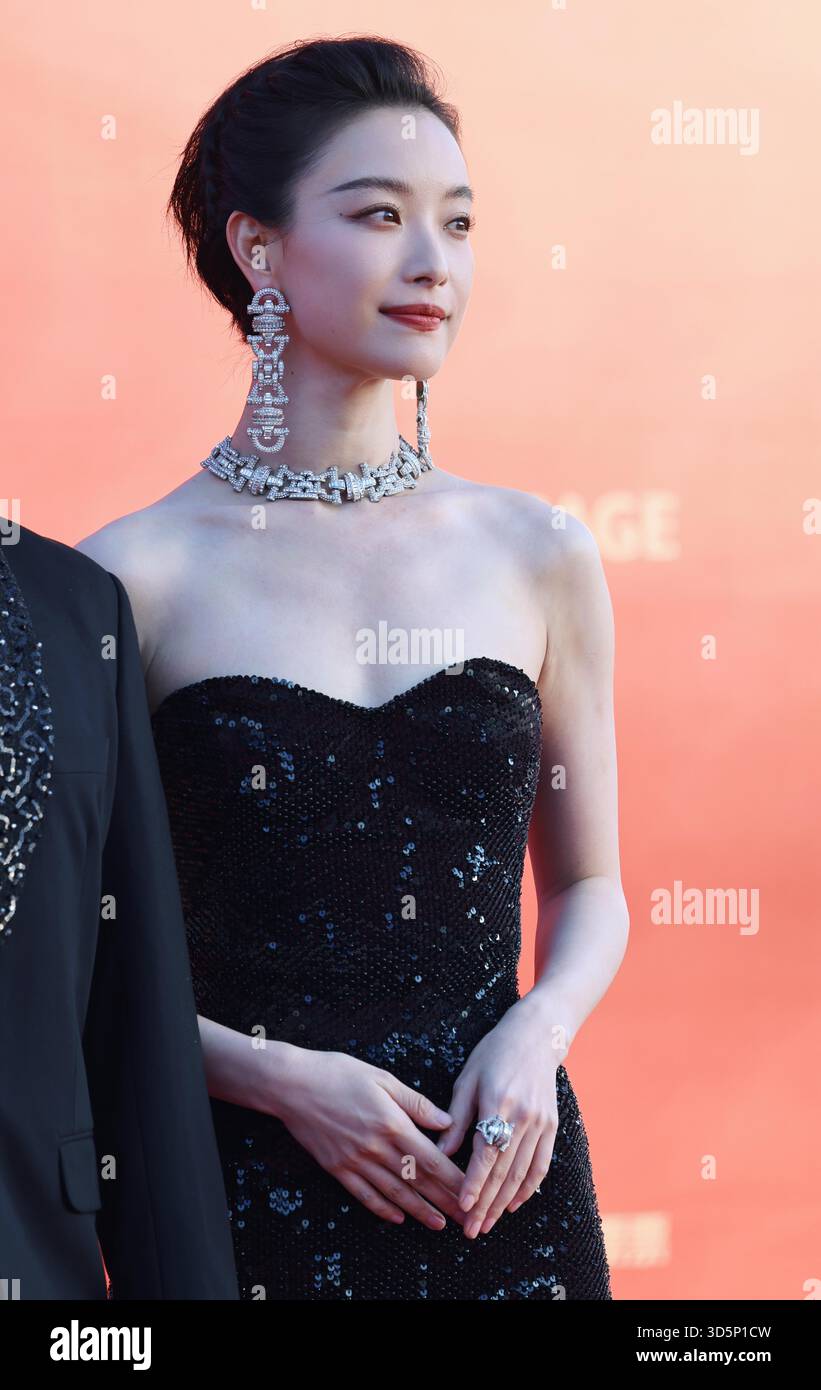 Chinese actress Ni Ni poses for a photo on the red carpet at the ...