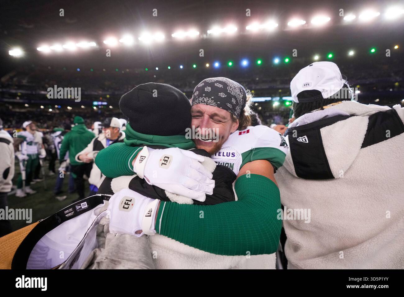 Saskatchewan Roughriders' C.J. Avery (35), left, hugs teammate Jayden ...