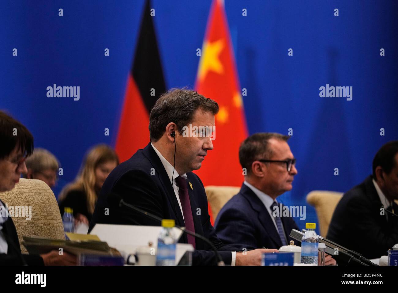 German Finance Minister Lars Klingbeil, center, holds high level talks ...