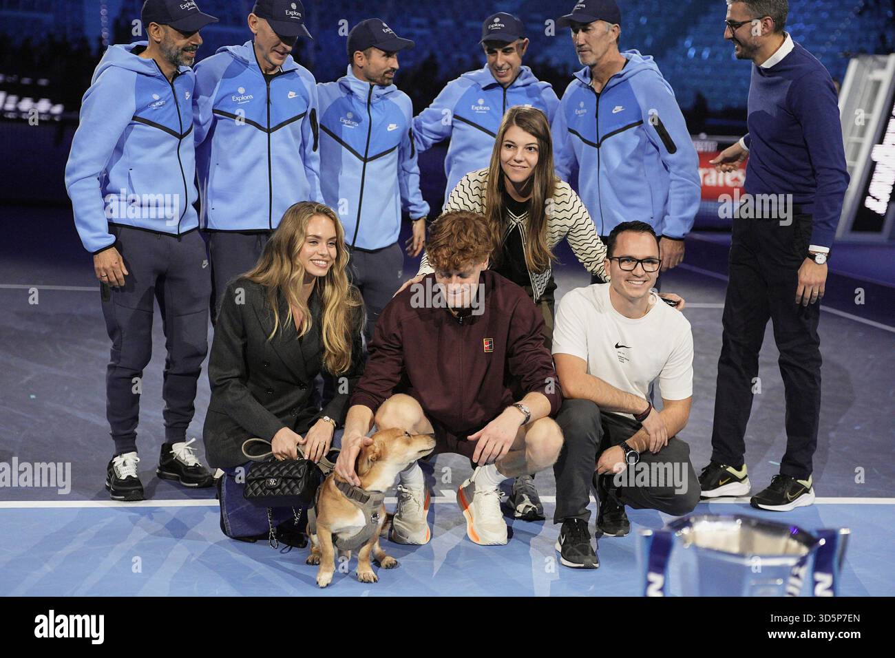 Italy's Jannik Sinner pets Snoopy the dog next to Danish model Laila ...