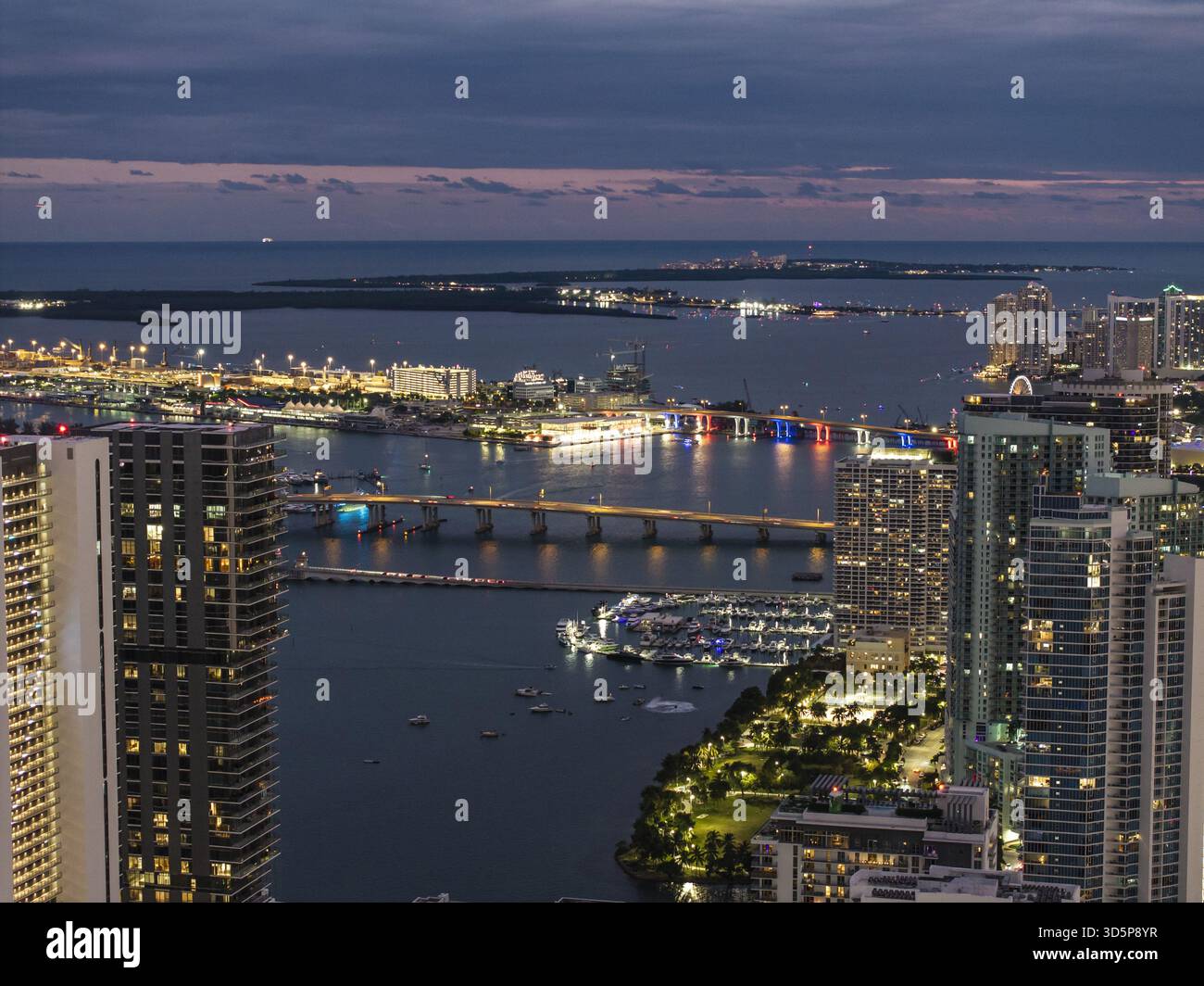 Aerial view of the Julia Tuttle Causeway bridge illuminated, spanning ...