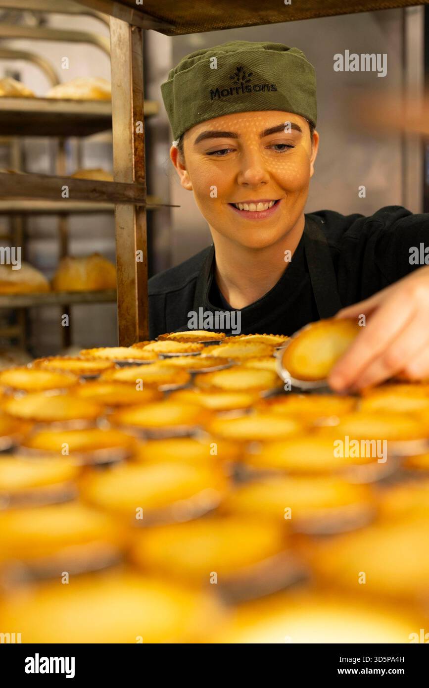 EDITORIAL USE ONLY Katie Thompson, baker at Morrisons Colindale store ...