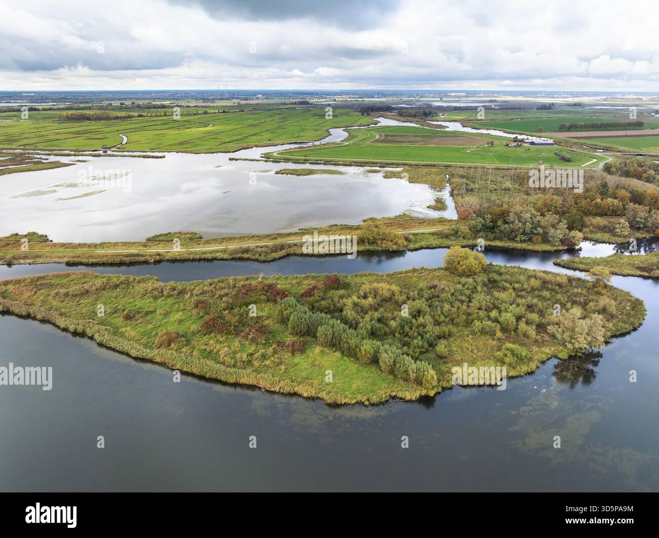 Aerial view of the waterways surrounding a verdant island, where the ...