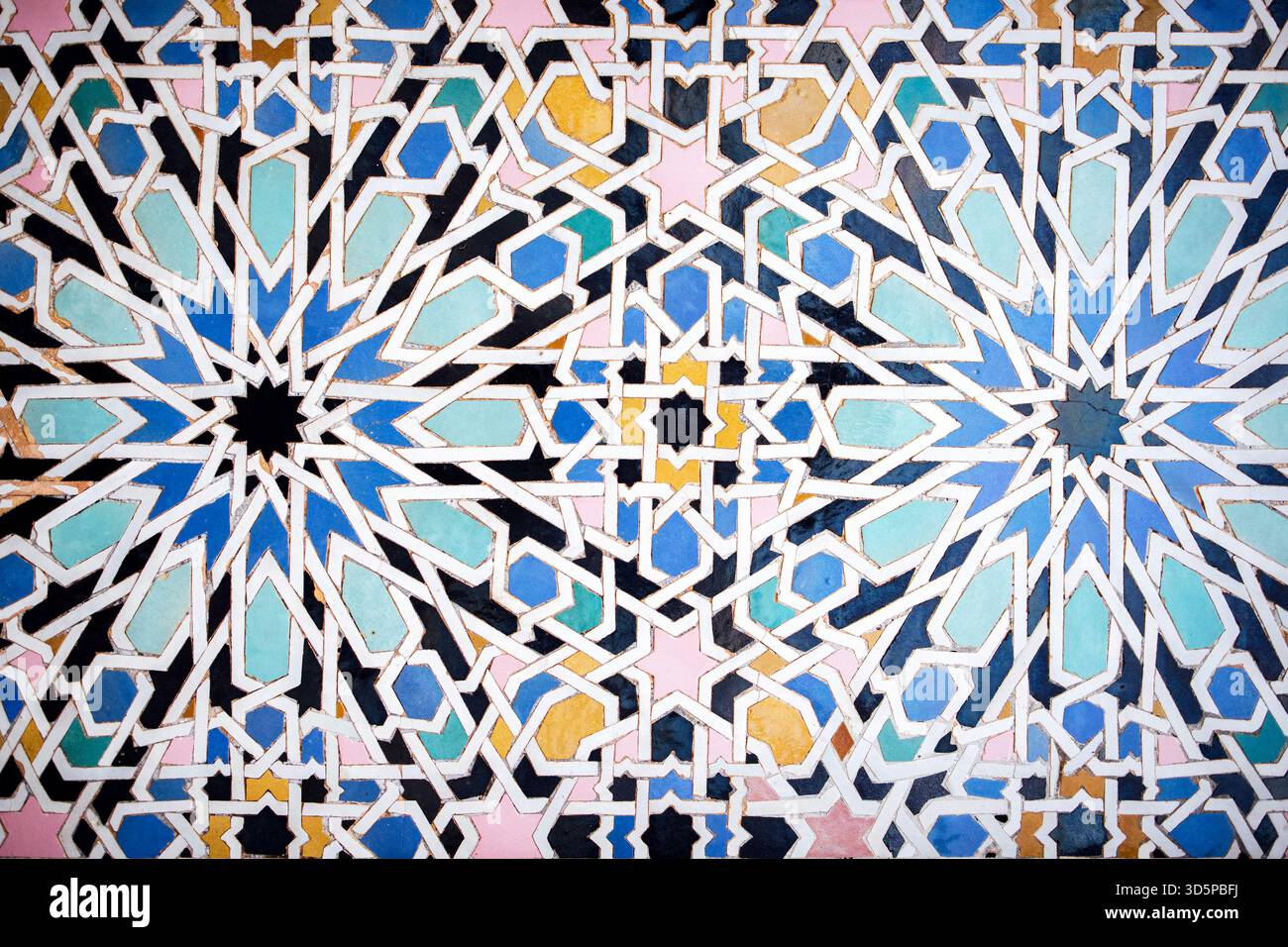 Detailed geometric tile pattern with vibrant colors and symmetrical ...
