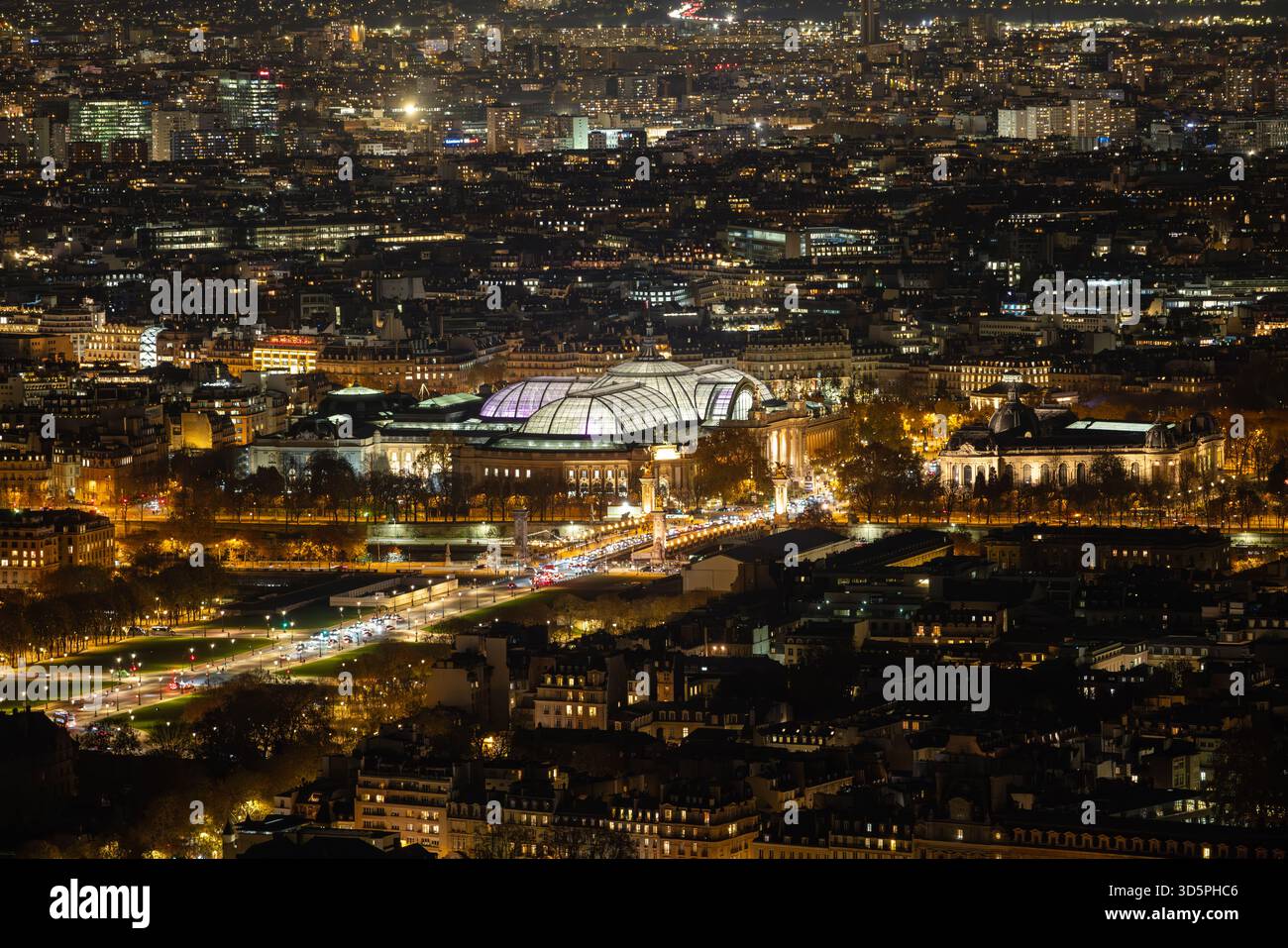 Aerial view of the Grand Palais's illuminated glass dome stands out ...