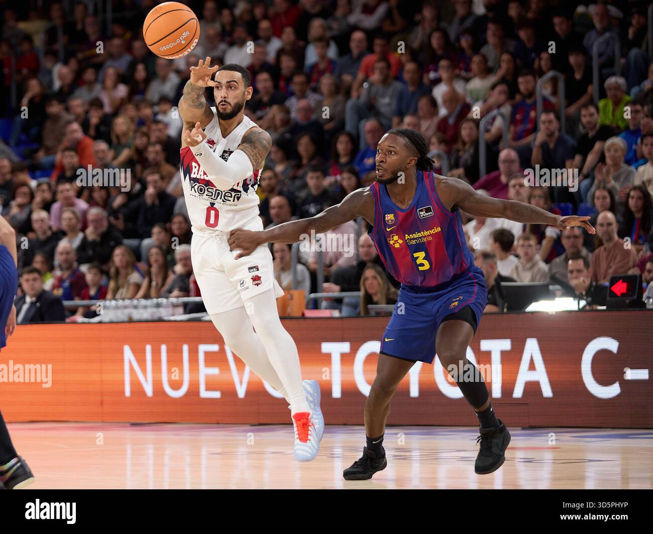 Markus Howard of Baskonia in action with Myles Cale of FC Barcelona during the ACB regular ...