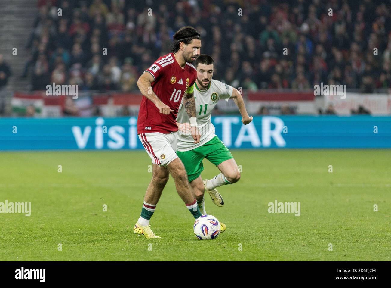 Budapest, Hungary. 16th, November 2025. Dominik Szoboszlai (10) of Hungary and Finn Azaz (11) of ...
