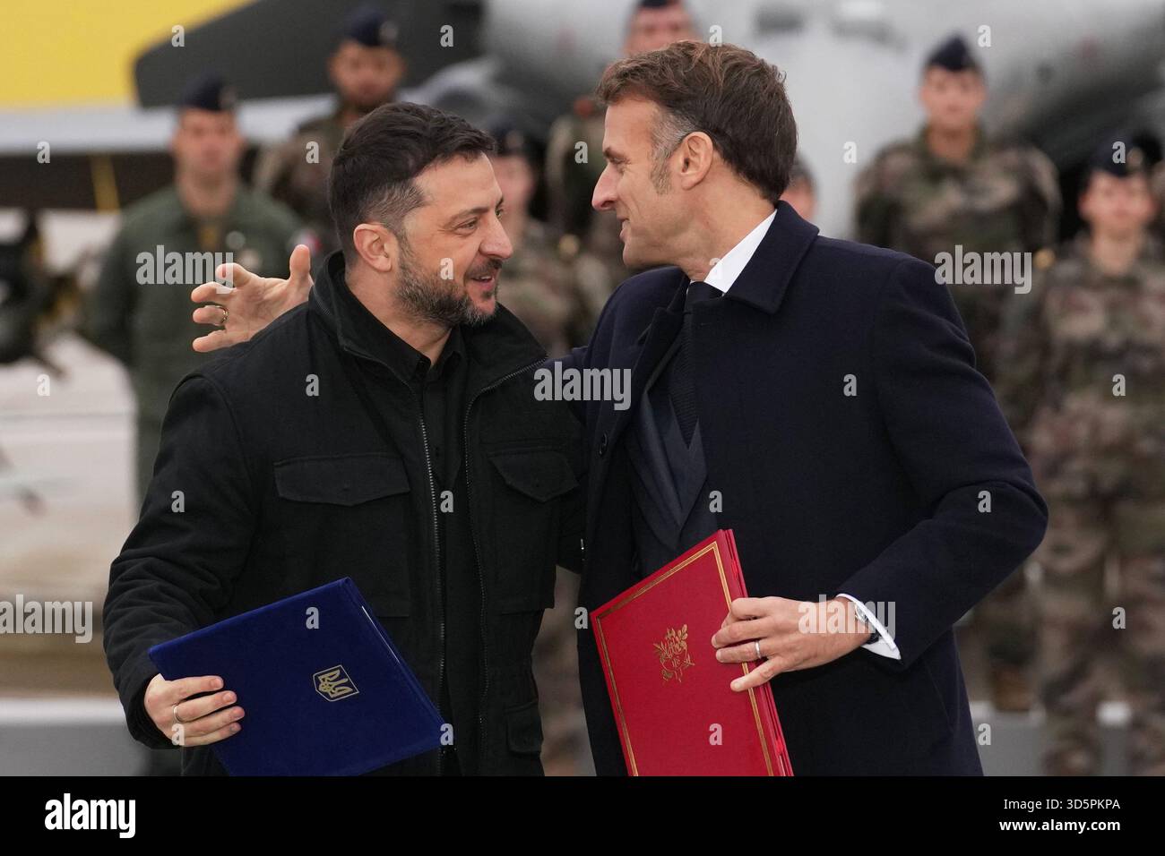 French President Emmanuel Macron, right, and Ukrainian President ...