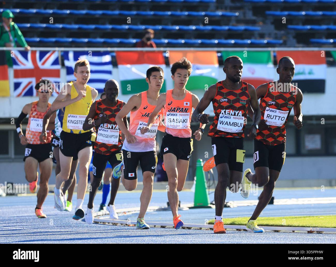 Athletes compete during the men's 10000 m final at the Tokyo 2025 ...