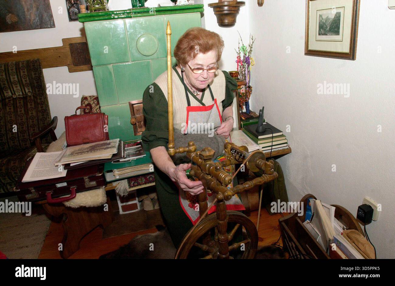 traditional wool spinning on a spinning wheel, fashion and design ...