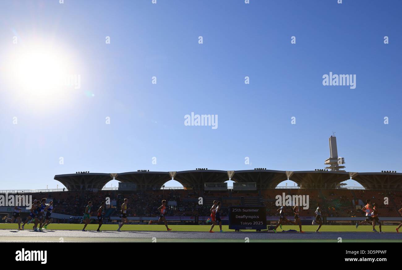 Athletes compete during the men's 10000 m final at the Tokyo 2025 ...