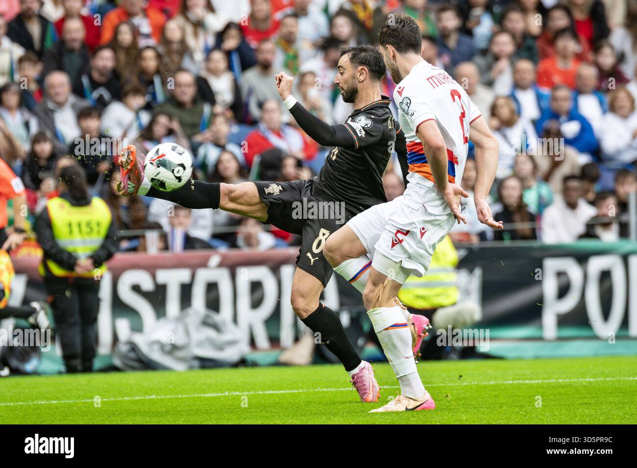 Bruno Fernandes of Portugal and Sergey Muradyan of Armenia during the FIFA World Cup 2026 ...