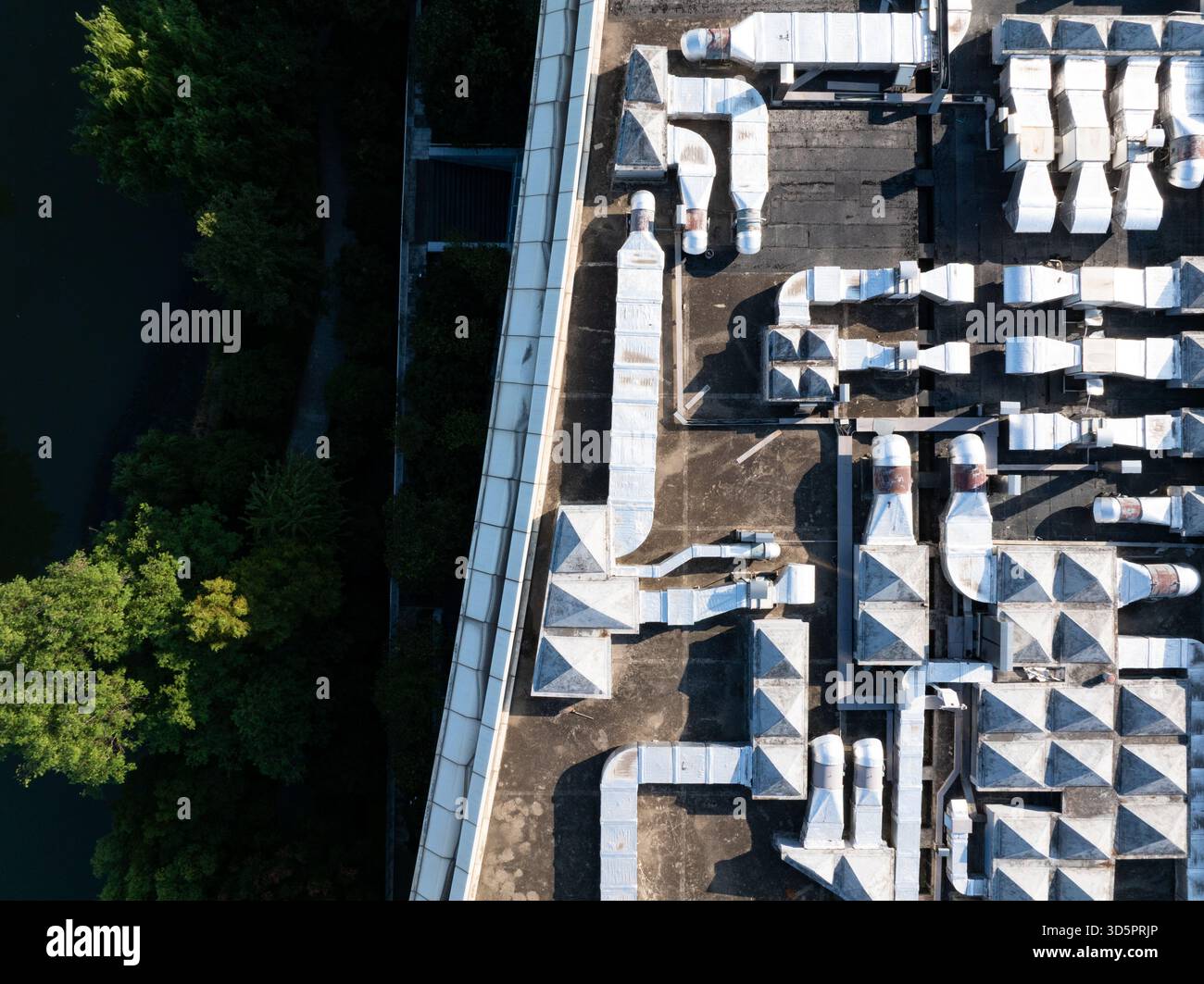 Aerial view of building rooftop with HVAC ducts Stock Photo - Alamy