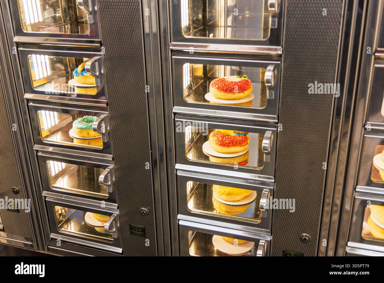 Brightly lit vending machine hi-res stock photography and images - Alamy