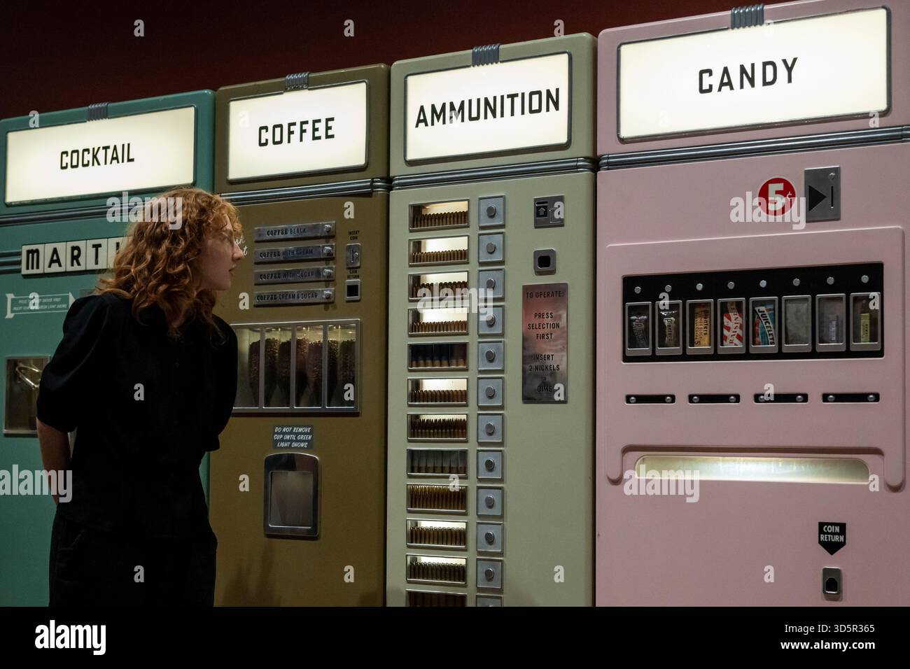 London, UK. 17 November 2025. A staff member with Vending machines from ...