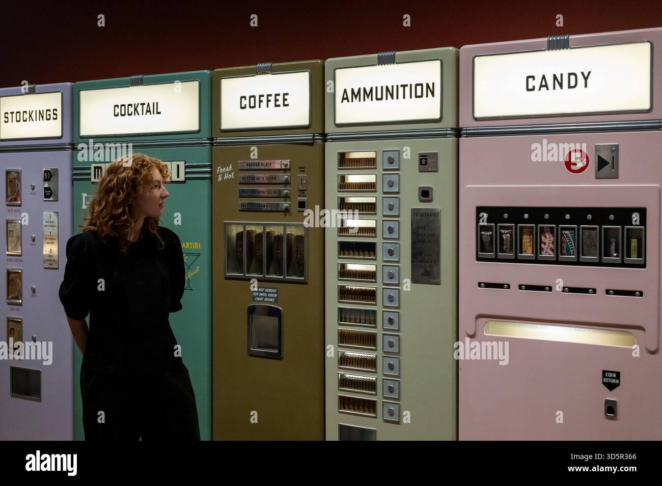 London, UK. 17 November 2025. A staff member with Vending machines from ...