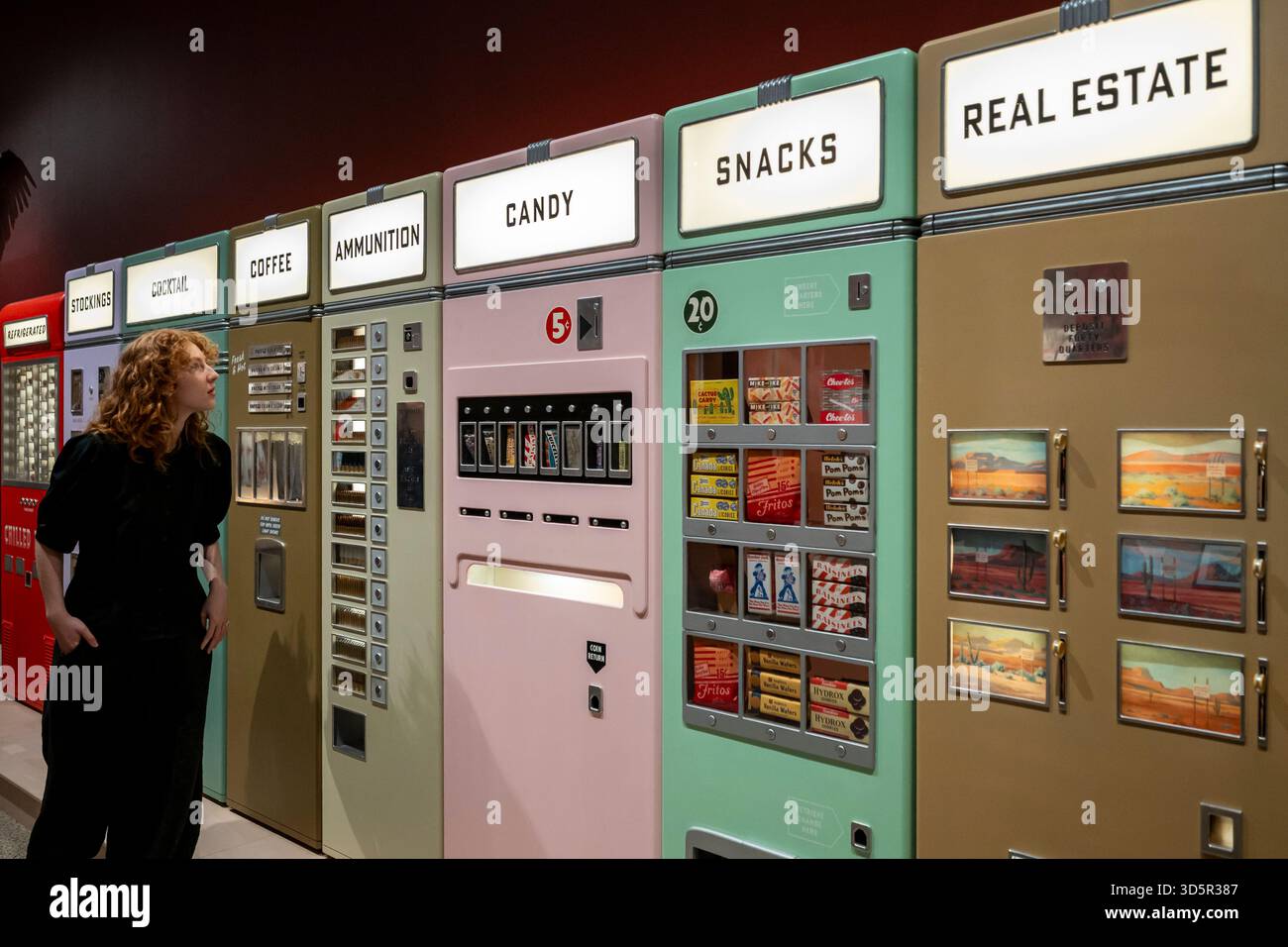 London, UK. 17 November 2025. A staff member with Vending machines from ...