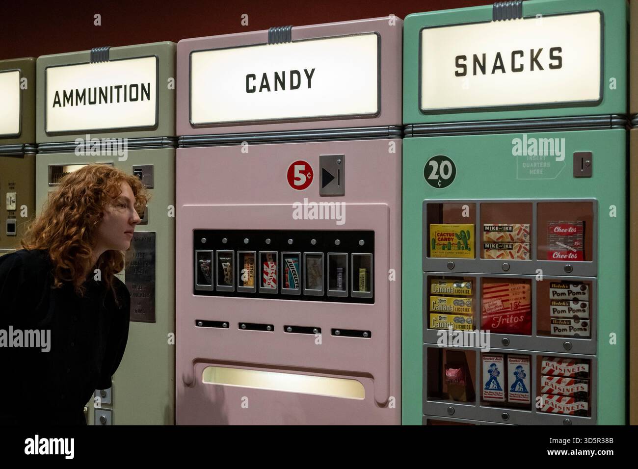 London, UK. 17 November 2025. A staff member with Vending machines from ...