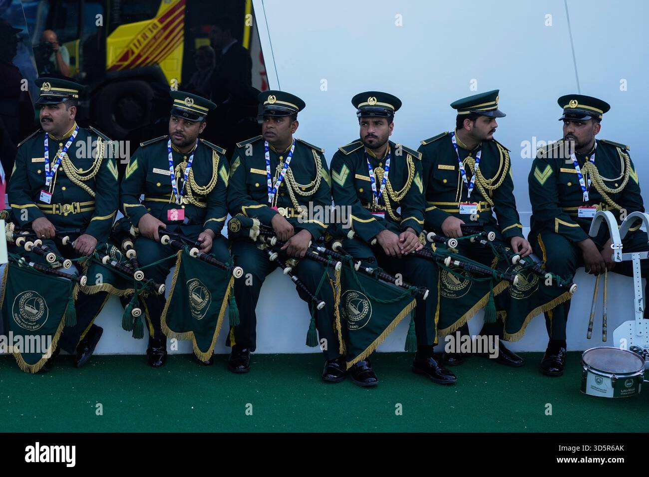 Members of Dubai police band sit after the opening ceremony of the ...