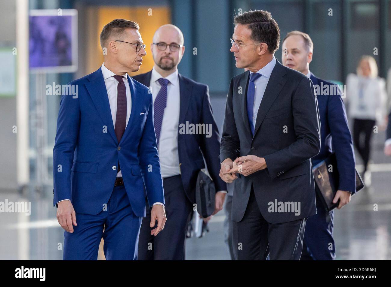 NATO Secretary General Mark Rutte, right, greets Finland's President ...