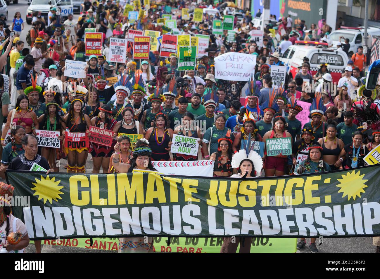 Indigenous peoples participate in a protest for climate justice during ...