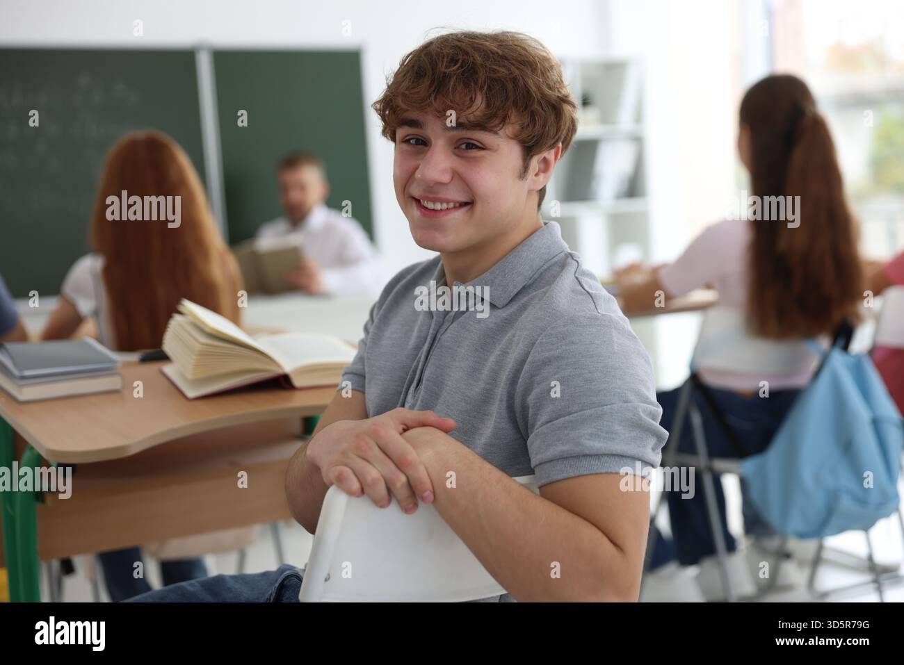 Teacher and students during lesson in classroom, selective focus Stock ...