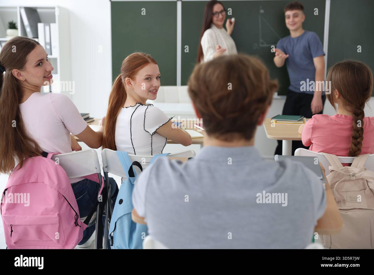 Teacher and students during lesson in classroom, selective focus Stock ...