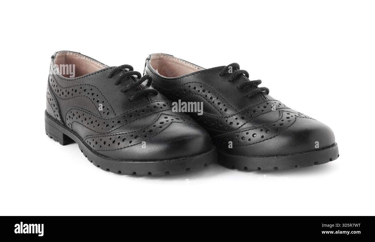 Pair of stylish kid's brogue shoes isolated on white Stock Photo - Alamy