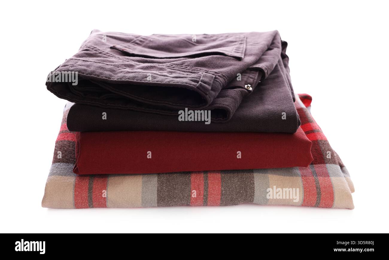 Stack of clean clothes isolated on white Stock Photo - Alamy