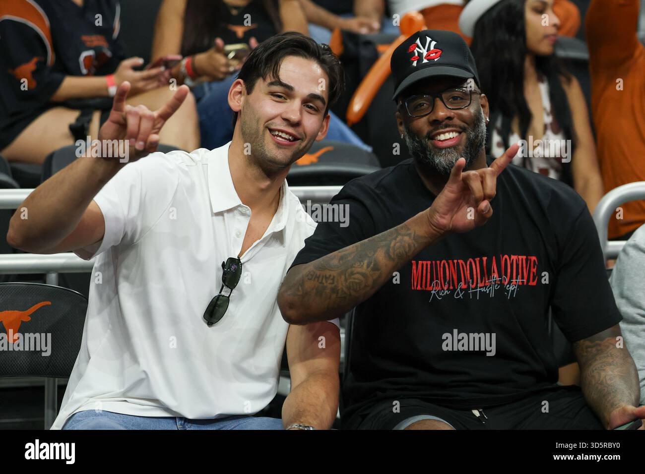 AUSTIN, TX - NOVEMBER 15: Former Texas Longhorns players Brock ...