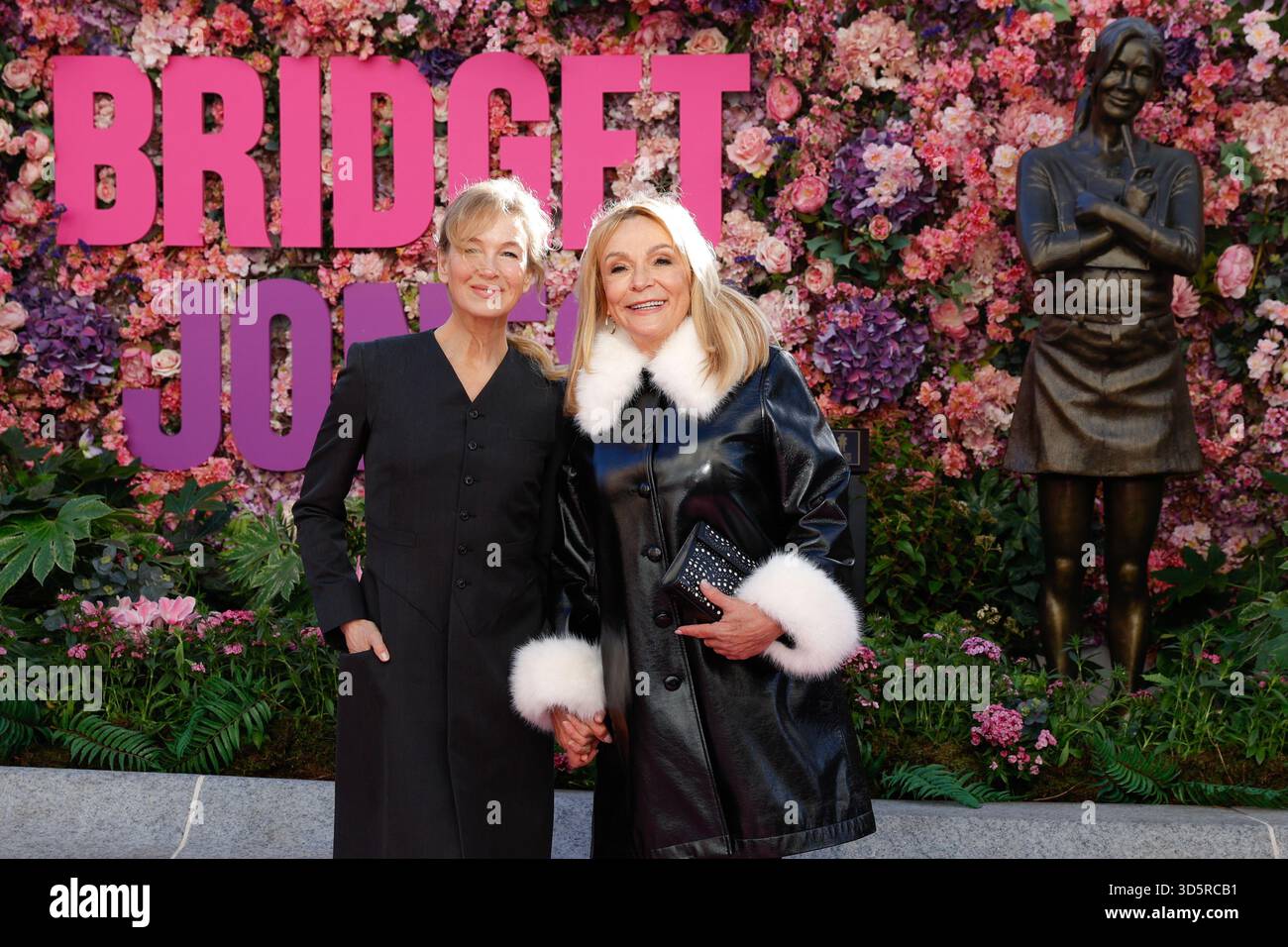Renee Zellweger, left, and writer Helen Fielding pose for photographers ...
