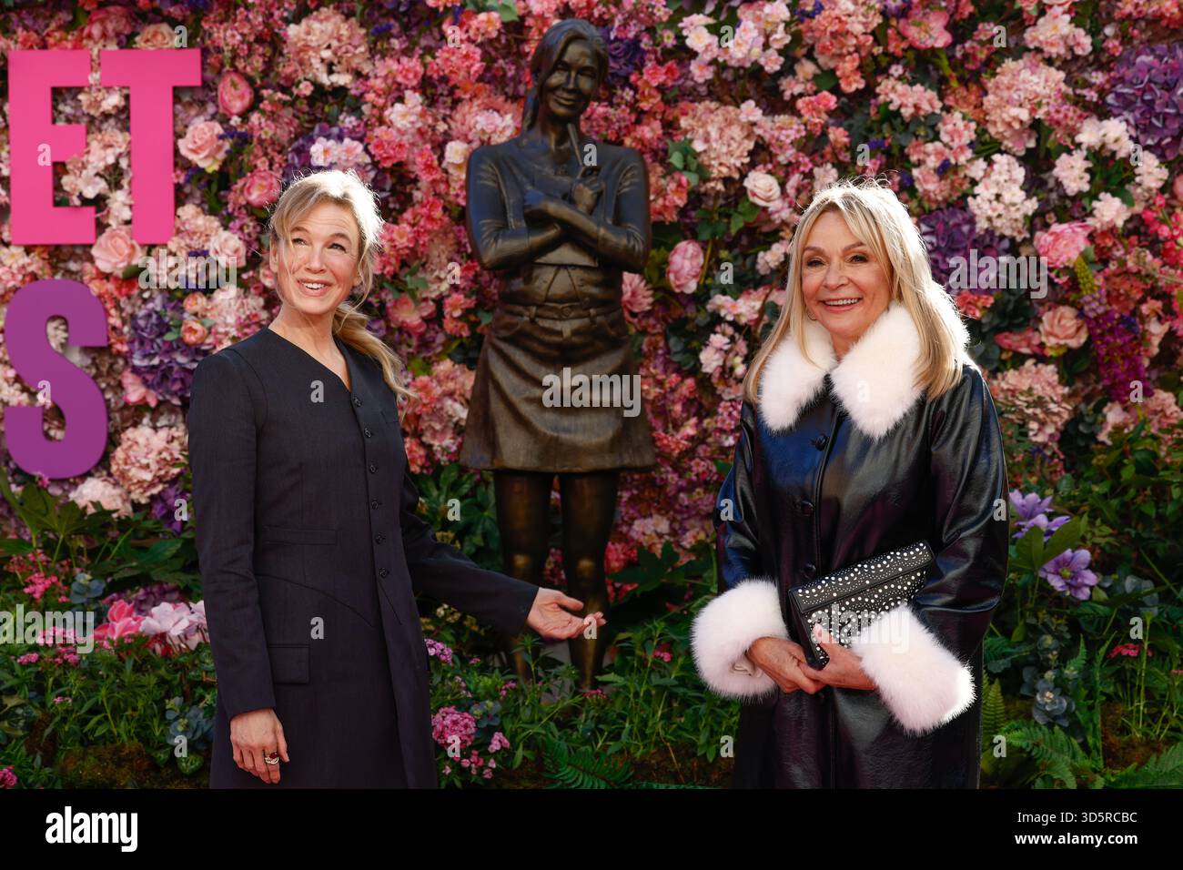 Renee Zellweger, left, and writer Helen Fielding pose for photographers ...