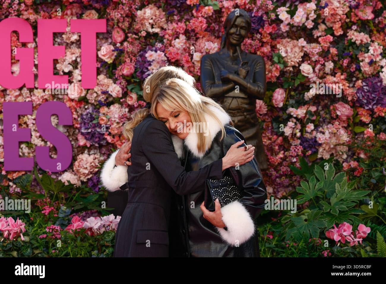 Renee Zellweger, left, and writer Helen Fielding pose for photographers ...