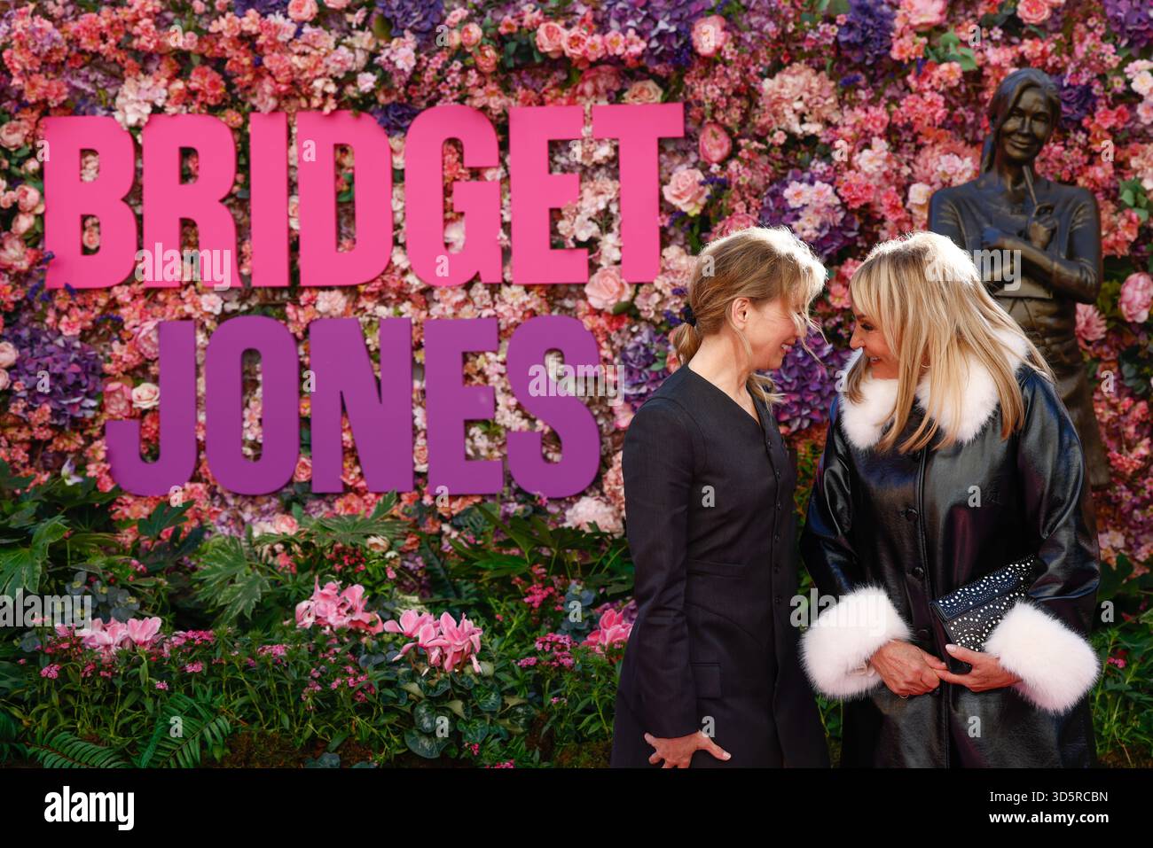 Renee Zellweger, left, and writer Helen Fielding pose for photographers ...