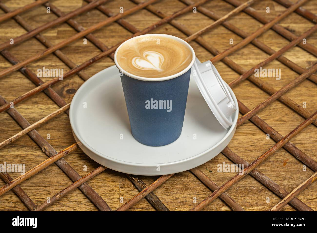 coffee with a silky texture and dense crema, served in a glass tumbler ...