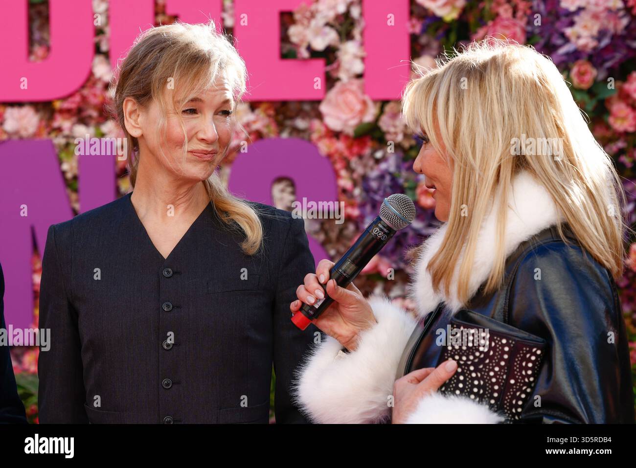 Renee Zellweger, left, and writer Helen Fielding pose for photographers ...