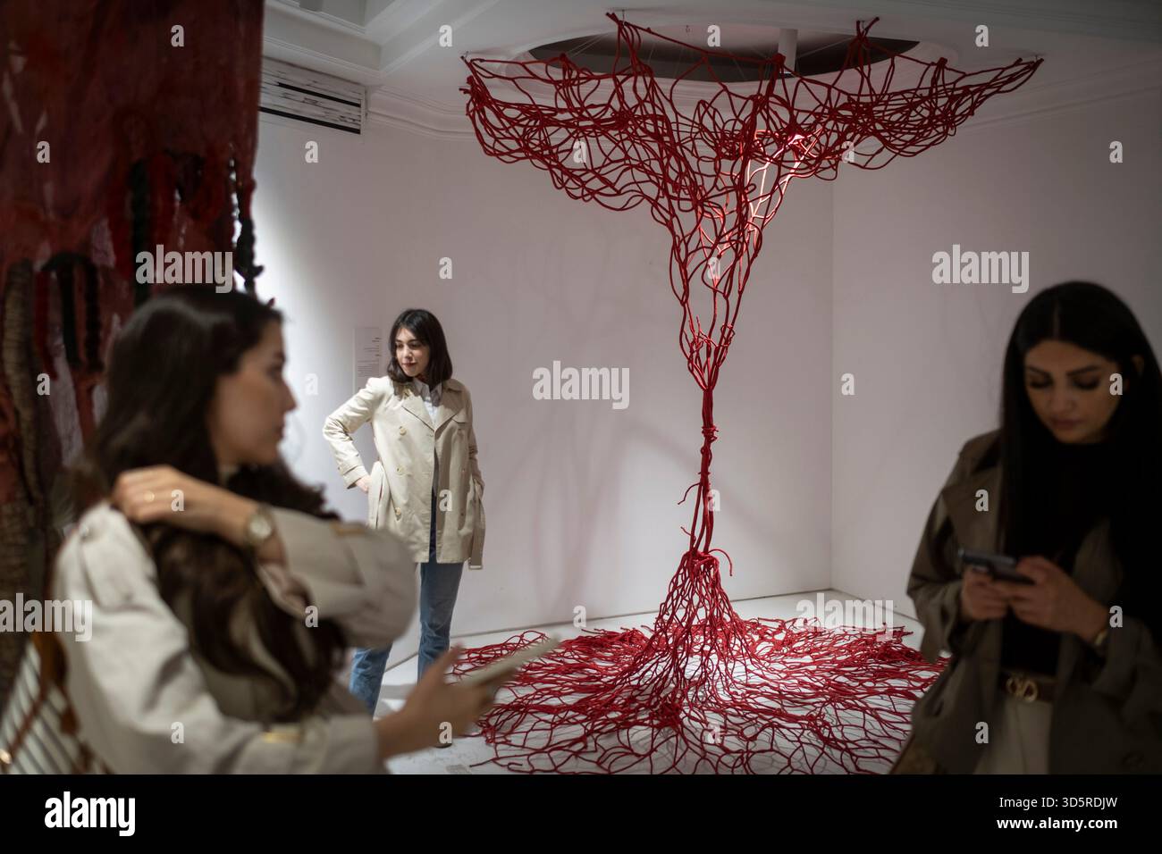 Young Iranian women visit an interactive fashion show at a gallery in ...