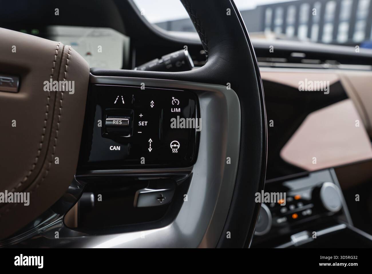 Luxury SUV steering wheel and console with driver assist controls Stock ...